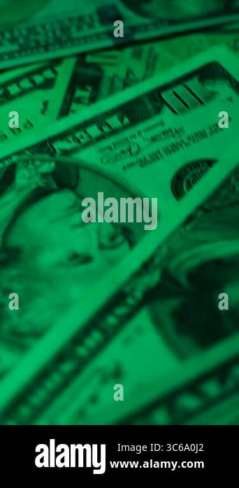 Vertical. A vibrant cascade of American currency. A flurry of American ...