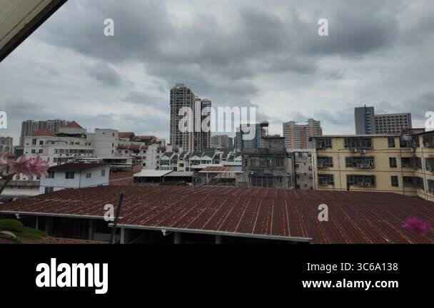 Time-lapse photography of urban residential buildings in rainy weather ...