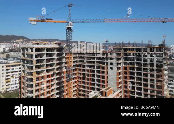 Construction site of a high-rise building at sunny day. The structures ...