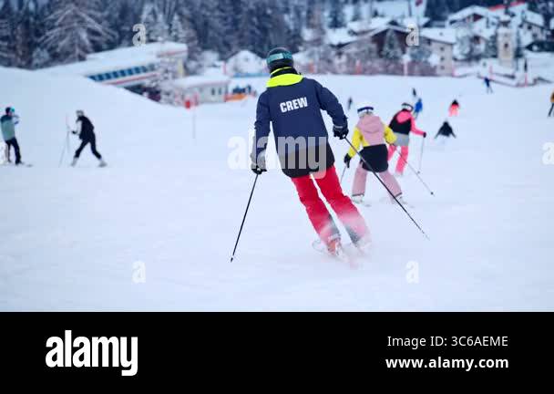 Dolomites, Italy - January 15, 2025: Multiple people skiing on the ...