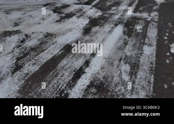 tire tracks on snow. tire tread marks on ground. winter tires. winter ...