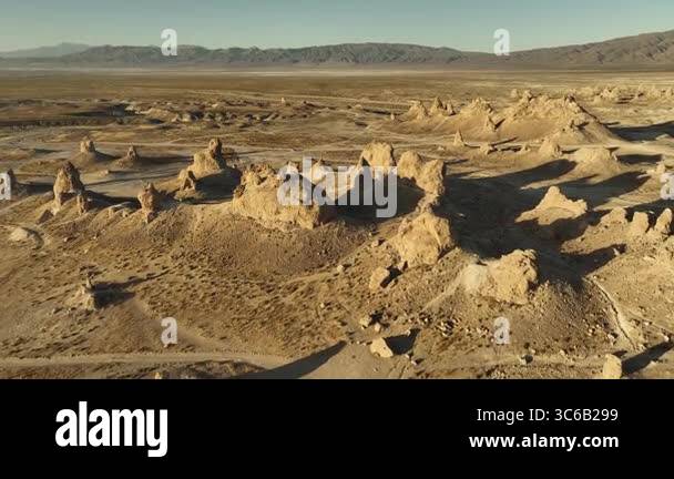 Trona Pinnacles Sunset Aerial Shot of Rock Formation Forward Tilt Down California Stock Video ...