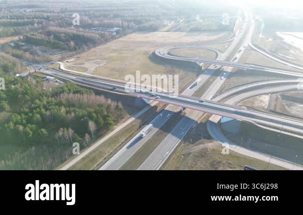 High-speed road junction with looping exit ramps aerial view Stock ...