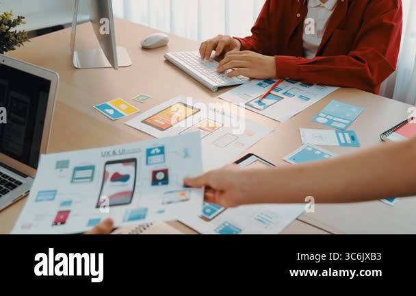 Excellent startup company employee presenting user interface prototype ...