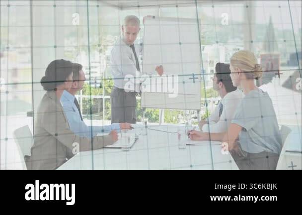 Business meeting with diverse team discussing strategy over graph ...