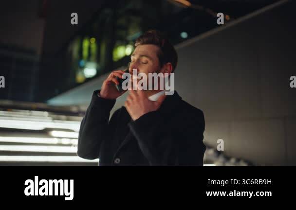 Emotional director calling night city closeup. Nervous boss talking ...