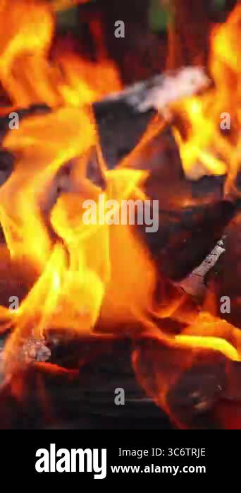 Close up of hot fire. Close up shot of burning firewood in the ...