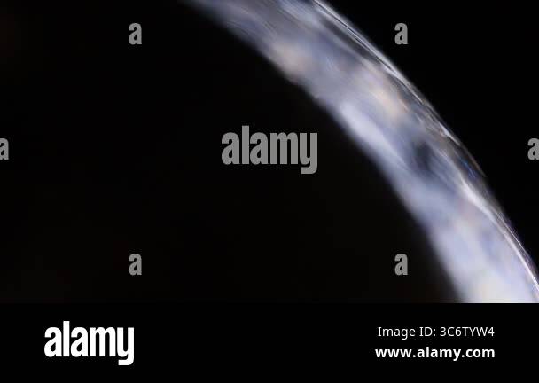 Movement of small white particles on black background, minimalist ...