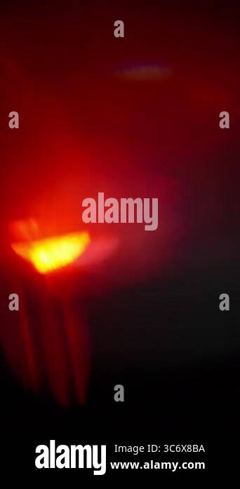 Abstract light leaks created from glass prism refraction. Slow motion ...