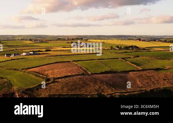 Experience the stunning beauty of the Irish countryside during sunset ...
