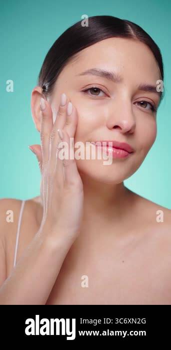 Beautiful Young Woman Touches Her Perfect Face. Natural Cosmetic ...