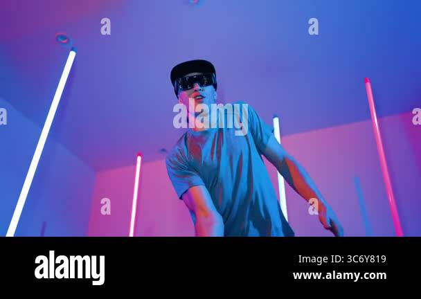 Low angle camera of caucasian dancer wearing fancy glasses and ...