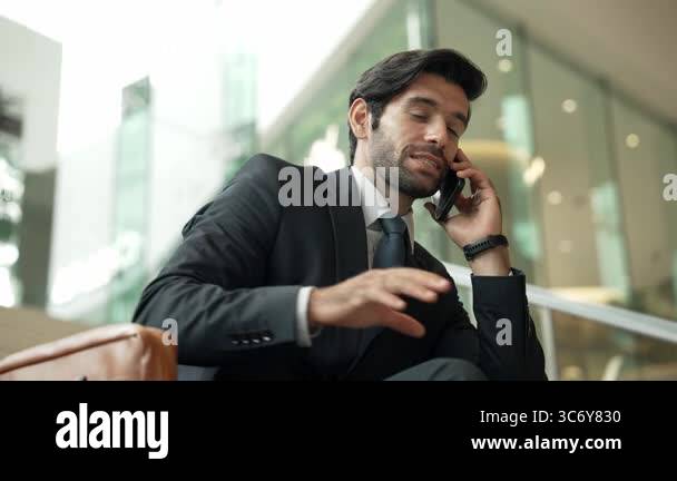 Smart business man calling phone to manager while discuss about ...