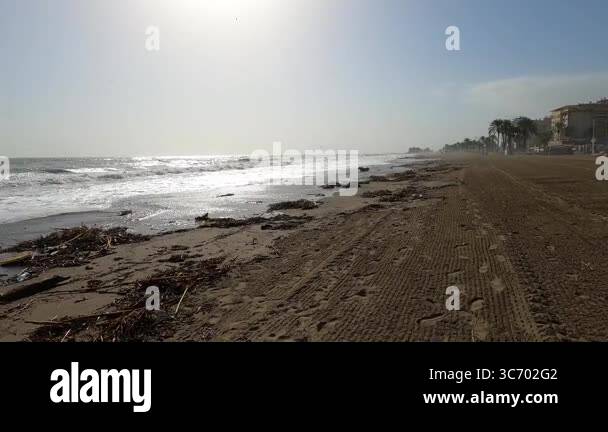 MALAGA, SPAIN - NOVEMBER 15, 2024: Coastal flooding and garbage caused ...