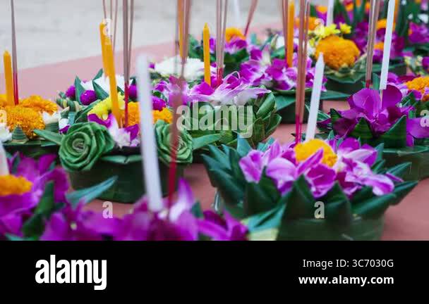 Traditional floral arrangement for a religious Thai ritual floating on ...