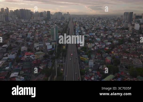 Aerial view of Manilas cityscape at twilight, showcasing symmetrical ...