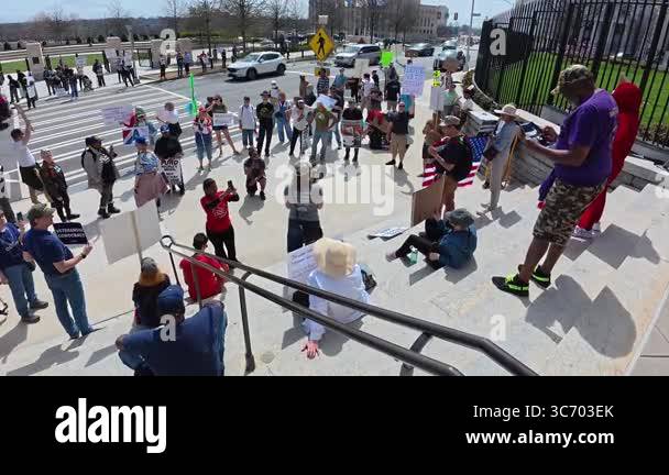 Atlanta, GA / USA March 14, 2025: Crowd gathers on state capitol steps ...