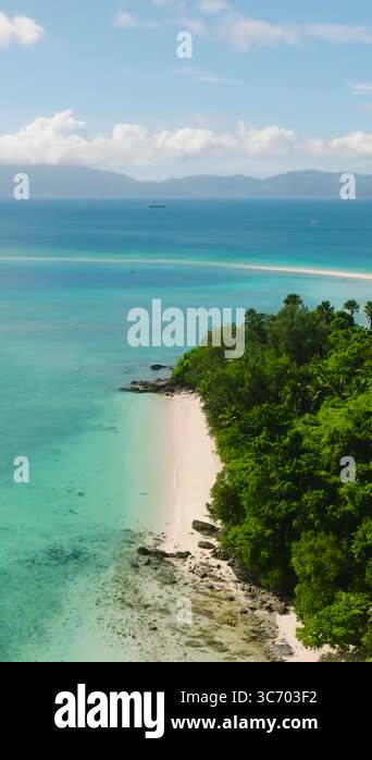 Bon Bon Beach with white sand and clear turquoise water, aerial view ...