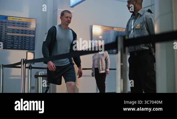Security Checkpoint: Man with Bionic Prosthetic Leg Walking Through X ...