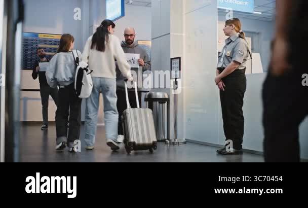 International Airport Terminal: Airport Greeter Holding Name Sign ...