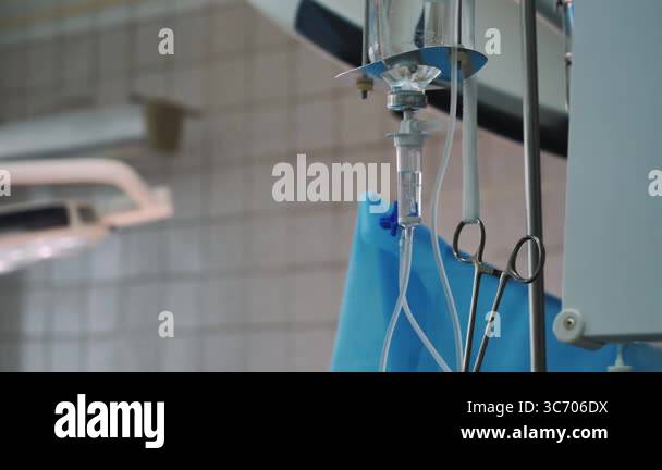 Close up isolated dropper of intravenous drug infusion system on ...