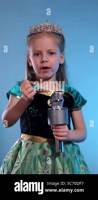 Vertical. A little princess, voice soaring, a captivating performance ...