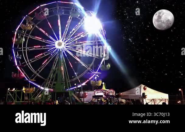 Ferris Wheel Spinning Against a Starry Sky with the Moon. 4K Resolution ...