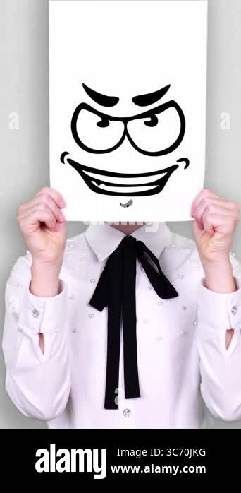 portrait, teenager holds white paper sheet with insidious smiley ...