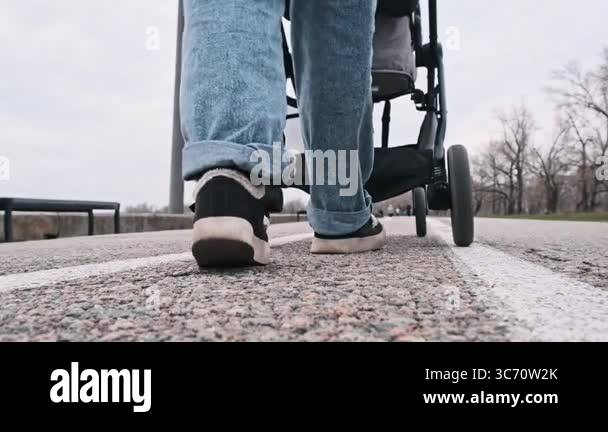 Pedestrian pushes baby stroller Stock Videos & Footage - HD and 4K ...