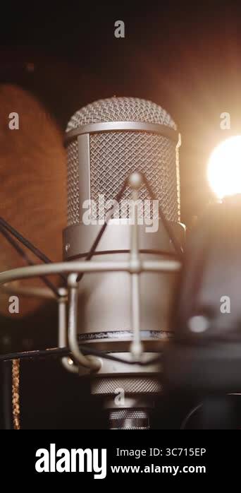 Vertical Format Video of Professional microphone and headphones at ...