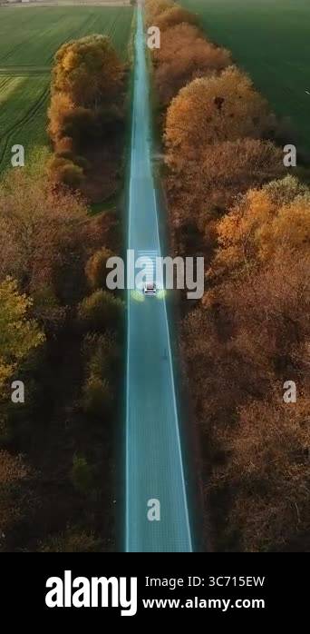 Vertical Video of Autonomous Self-Driving Electric Car Driving on Road ...