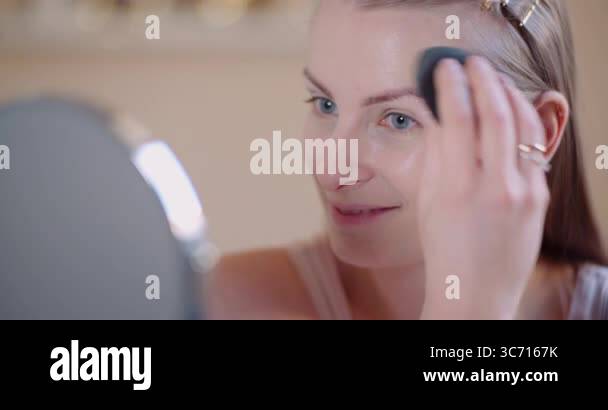 Close-up of womans face during makeup application, showing detail of ...