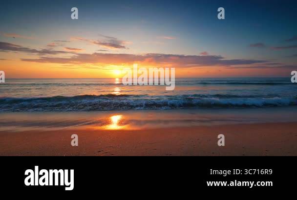Golden Sun Rising Over Misty Horizon and Peaceful Ocean Waves ...