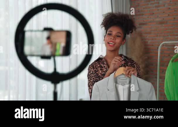 Woman influencer shoot live streaming vlog video review clothes crucial ...