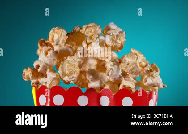Super Slow Motion of Popcorn Falling on Gradient Background . Filmed on ...