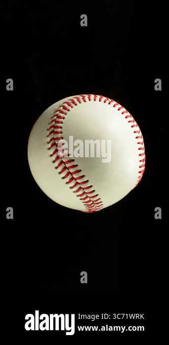 Super Slow Motion of Moving Baseball Ball. Isolated on Black Background ...