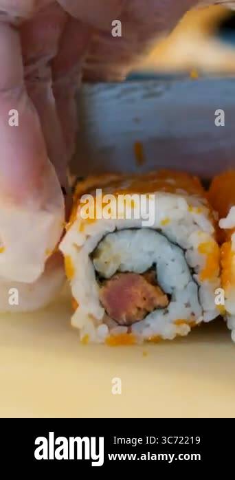 cooking tuna and shrimp rolls step by step cooking process sushi chef hands Chef making sushi ...