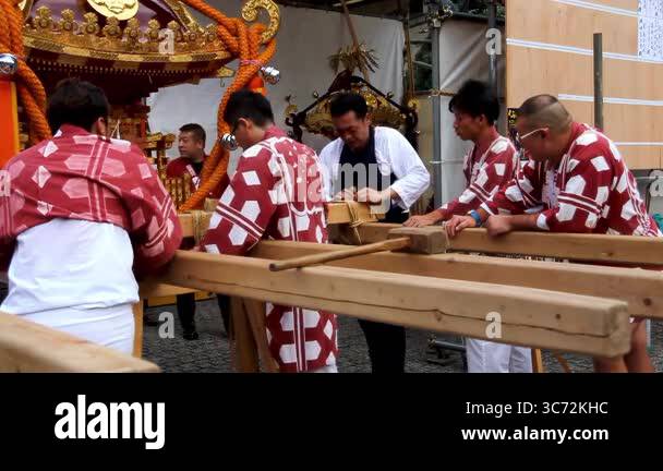 22 September 2024: Preparing a mikoshi for the matsuri festival - men ...