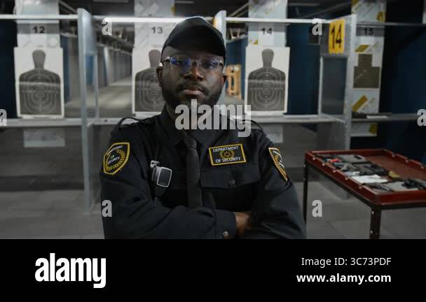 Medium closeup of confident African American male security guard ...