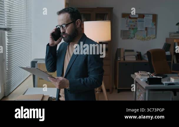 Medium side shot of male Caucasian psychologist in smart casual outfit ...