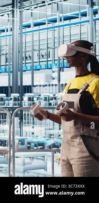 Vertical video Photovoltaics smart factory technician fixing damaged ...