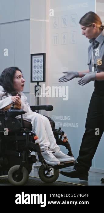 Security Checkpoint in Airport Terminal: Female Security Officer ...