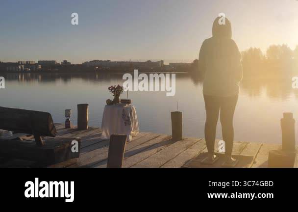 Woman standing on sadhu board, process of standing barefoot on nails ...