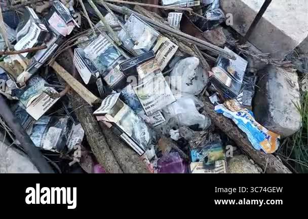 Uzhhorod, Ukraine. March 29, 2025: Discarded Cigarette Packs and Litter ...