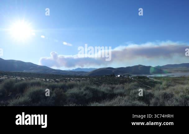 Smoke plume filling the sky over Nevada from a wildfire in California ...