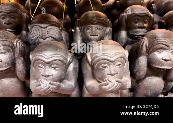 This is a remarkable collection of varied monkey figurines, each one ...