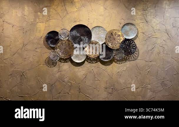 This unique arrangement of beautifully decorative plates creates an ...