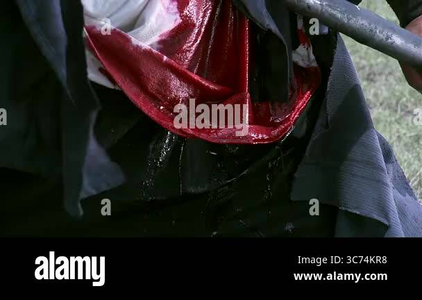 The soldier was seriously injured and his wounds kept bleeding Stock ...