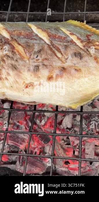 Delicious whole fish grilled to perfection with lemon and fresh ...