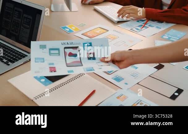 Excellent startup company employee presenting user interface prototype ...